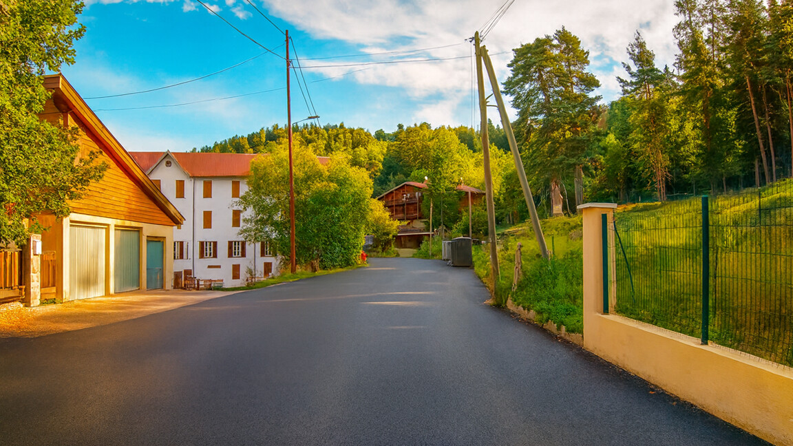 Driving through a quiet Alpine mountain village
