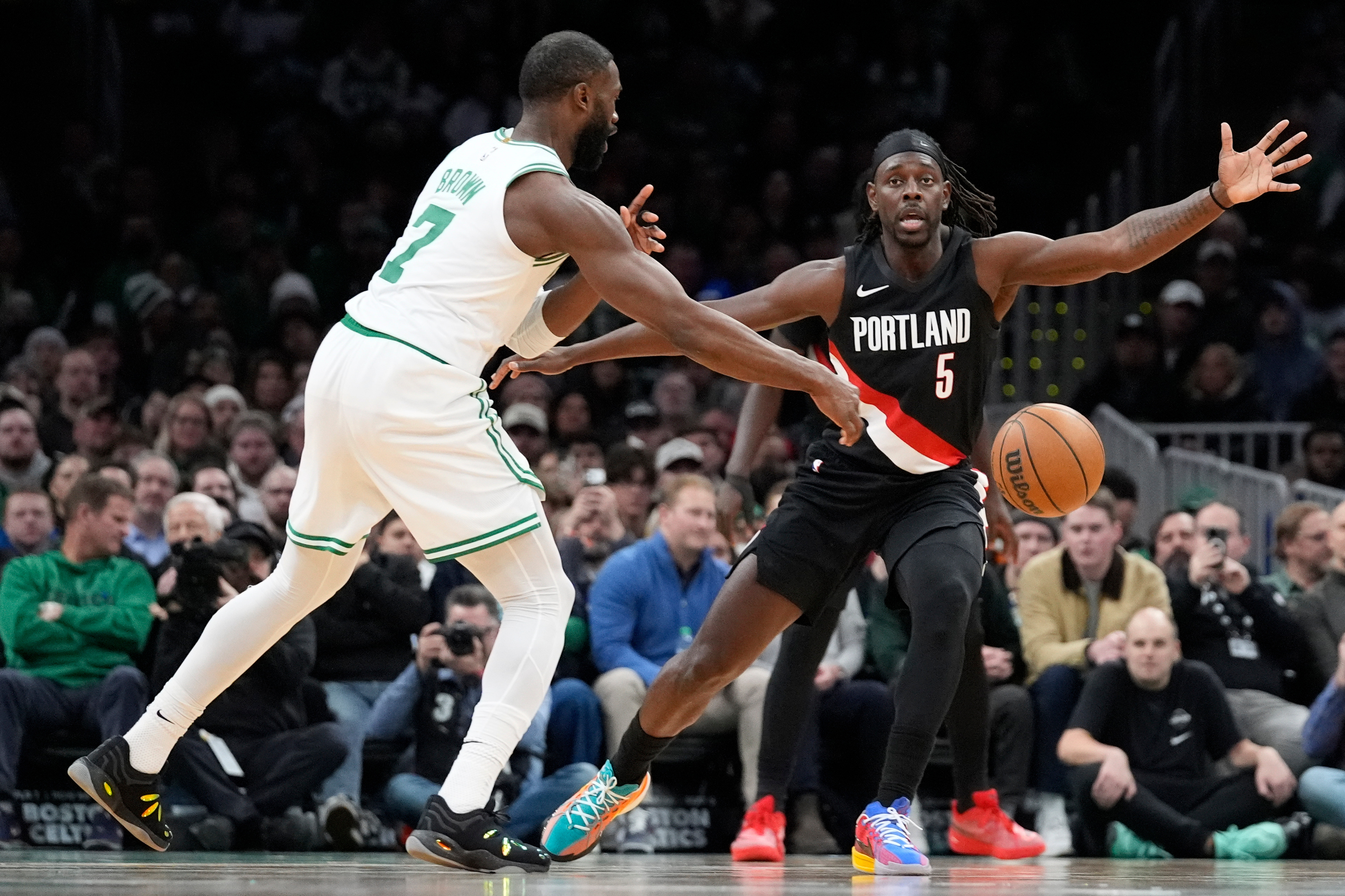 Blazers guard Jrue Holiday gets champion's welcome in return to Boston ...