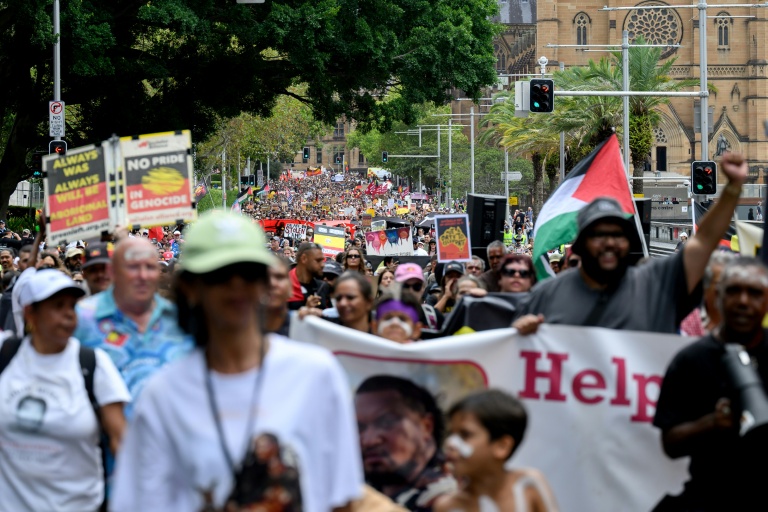 Man charged with throwing 'explosive device' into Australia Day rally