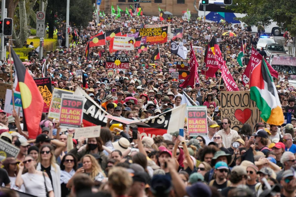 Man charged with throwing 'explosive device' into Australia Day rally