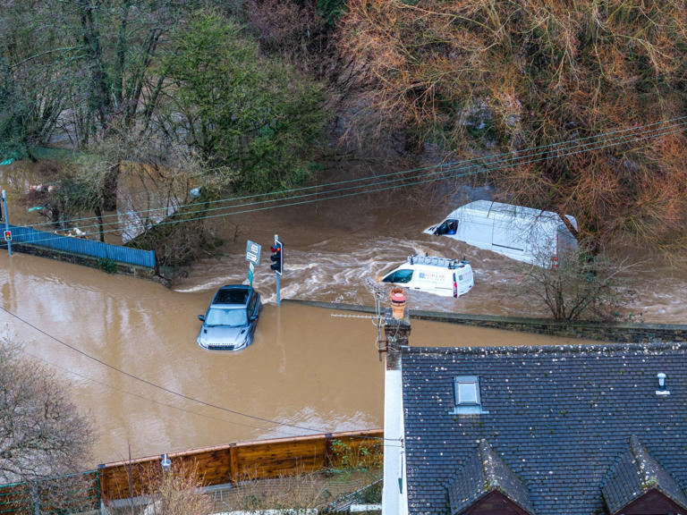 Drivers rescued from cars after Storm Chandra flooding