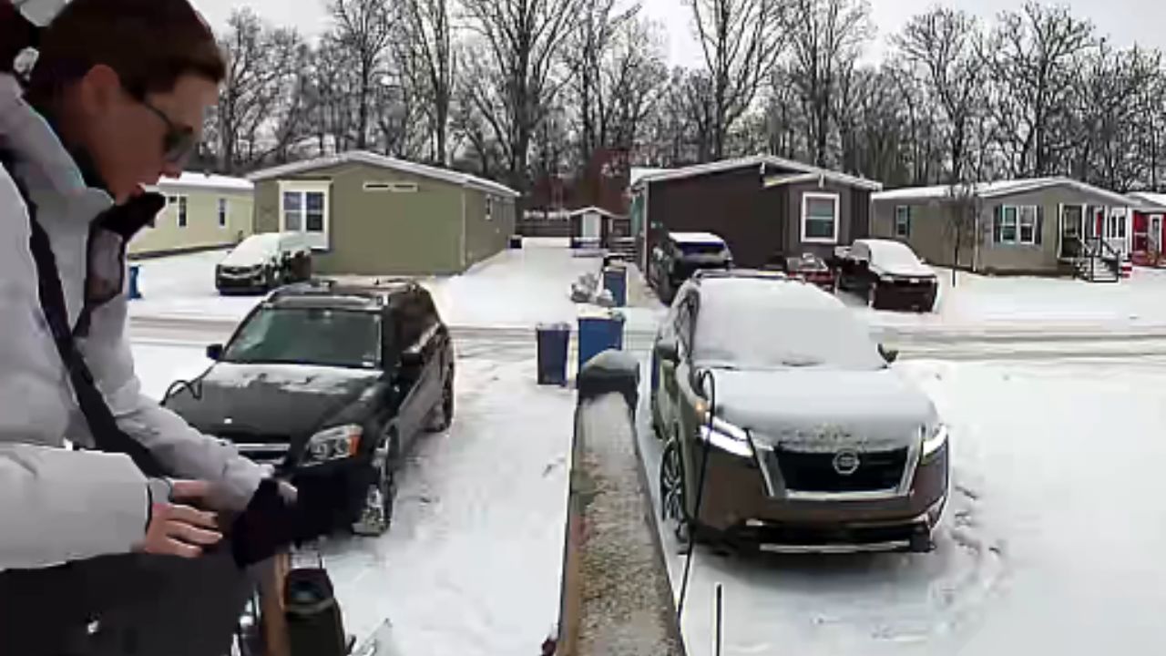 Girl slips on snow covered porch steps and falls down