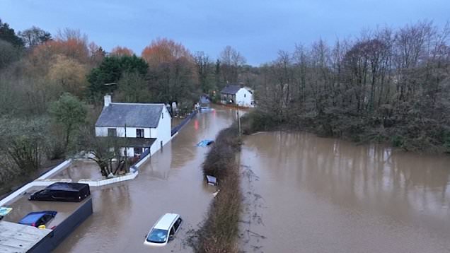 Storm Chandra causes catastrophic flooding at Weycroft Bridge in ...