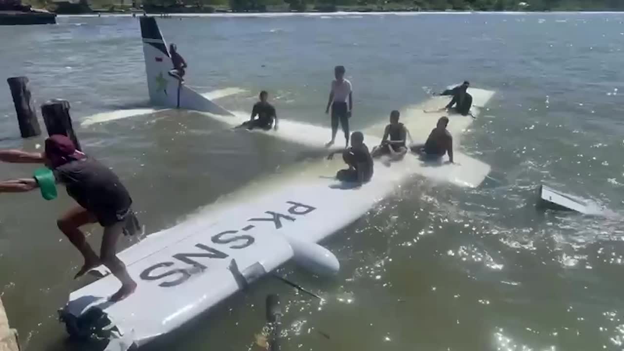 Cesna light aircraft carrying 13 passengers crashes into ocean in Indonesia