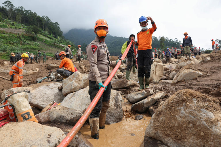 At least 23 soldiers killed as landslides devastate Indonesia