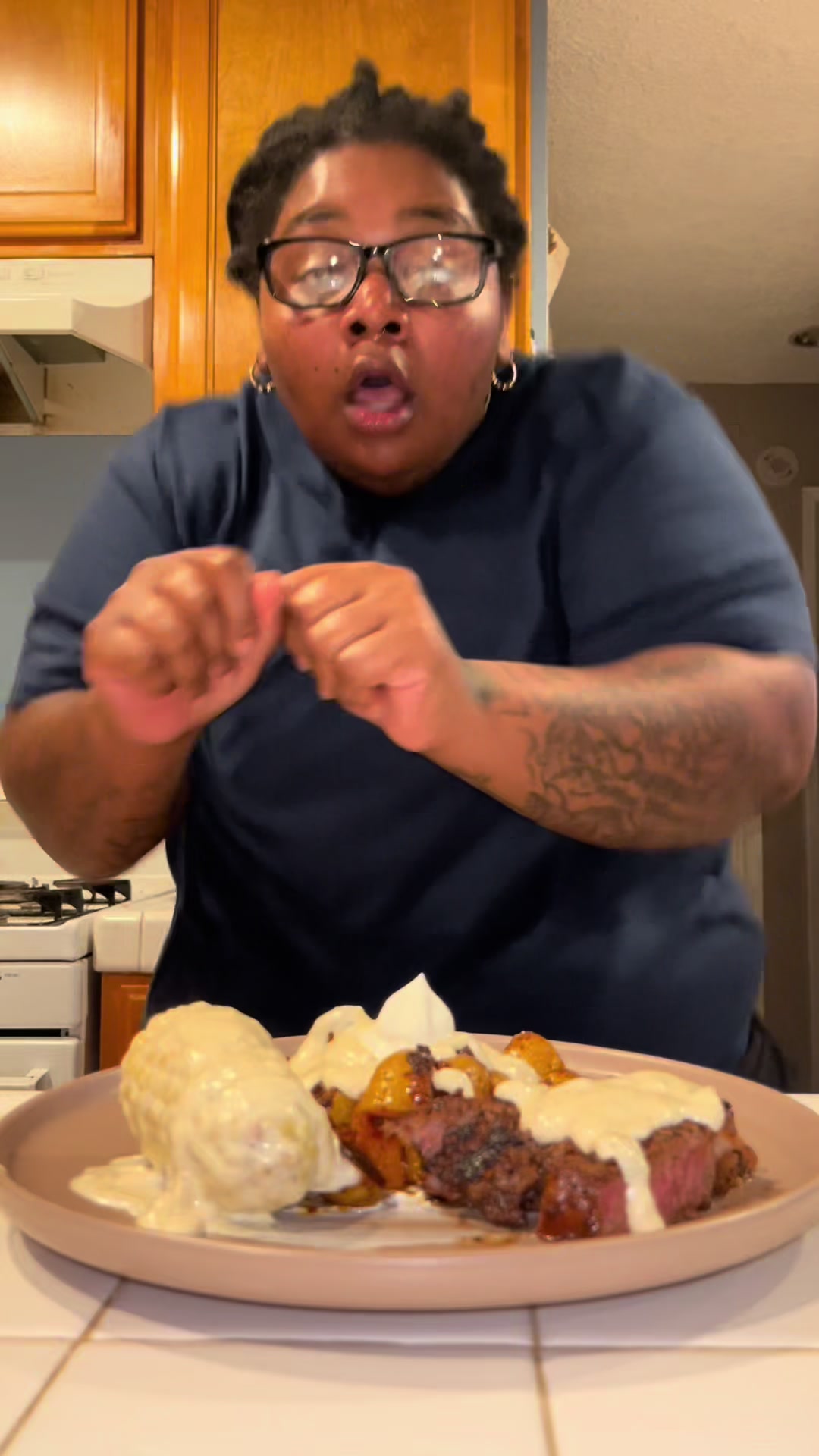 Steak, potatoes and corn with cheese sauce