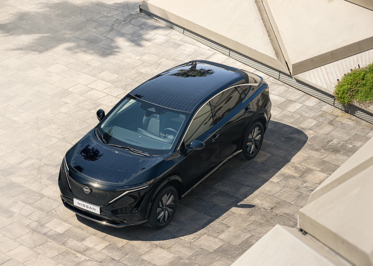 Nissan helps make Ariya SUV go further with solar panel concept