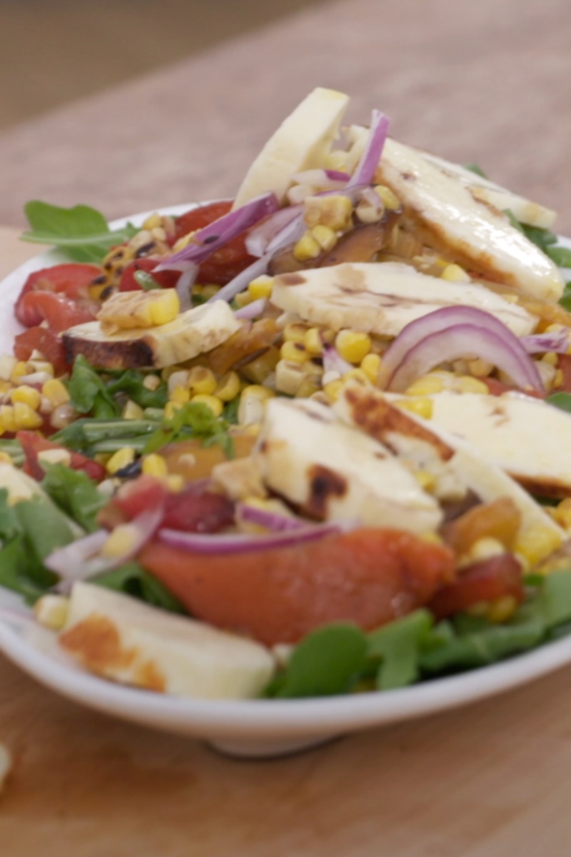 Rocket salad with charred corn peppers and grilled halloumi