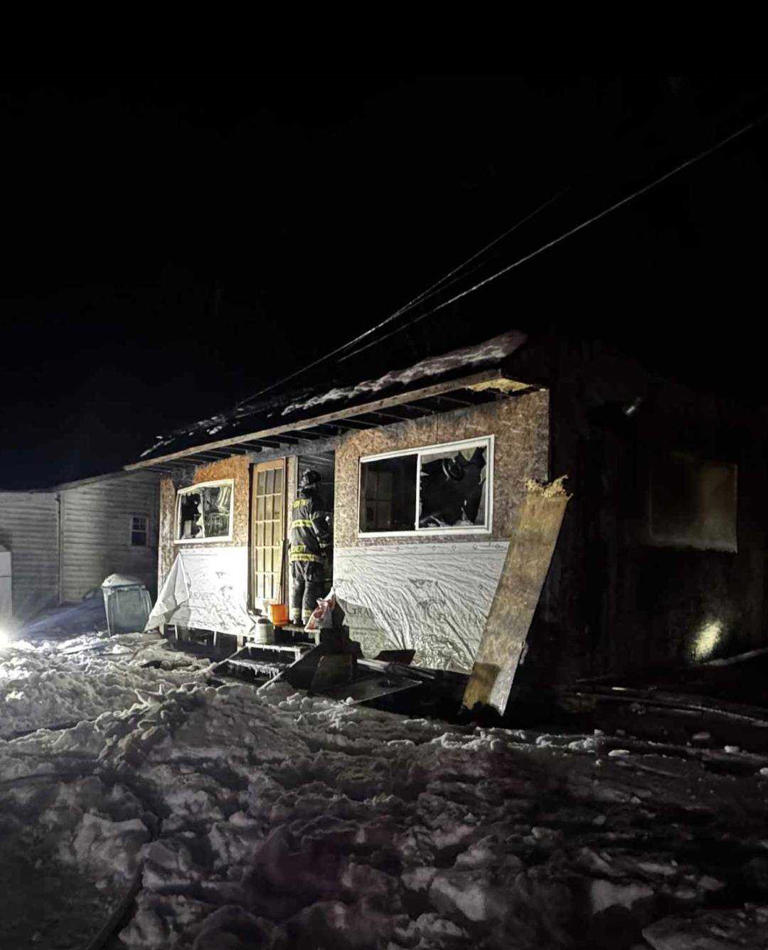 Flames shoot from burning chicken coop