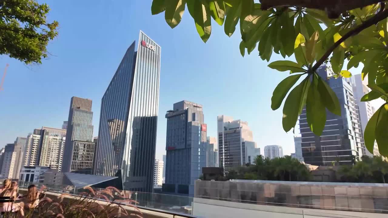 Multi-coloured meerkats lead the way to a shopping mall roof garden