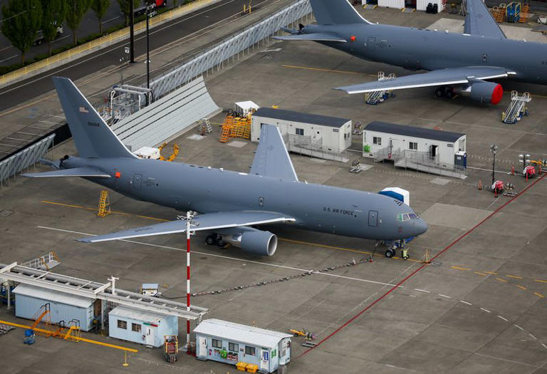 Planemaker Boeing swings to quarterly profit on sale, but unit losses ...