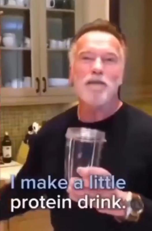 Arnold Schwarzenegger making a protein drink the old school way