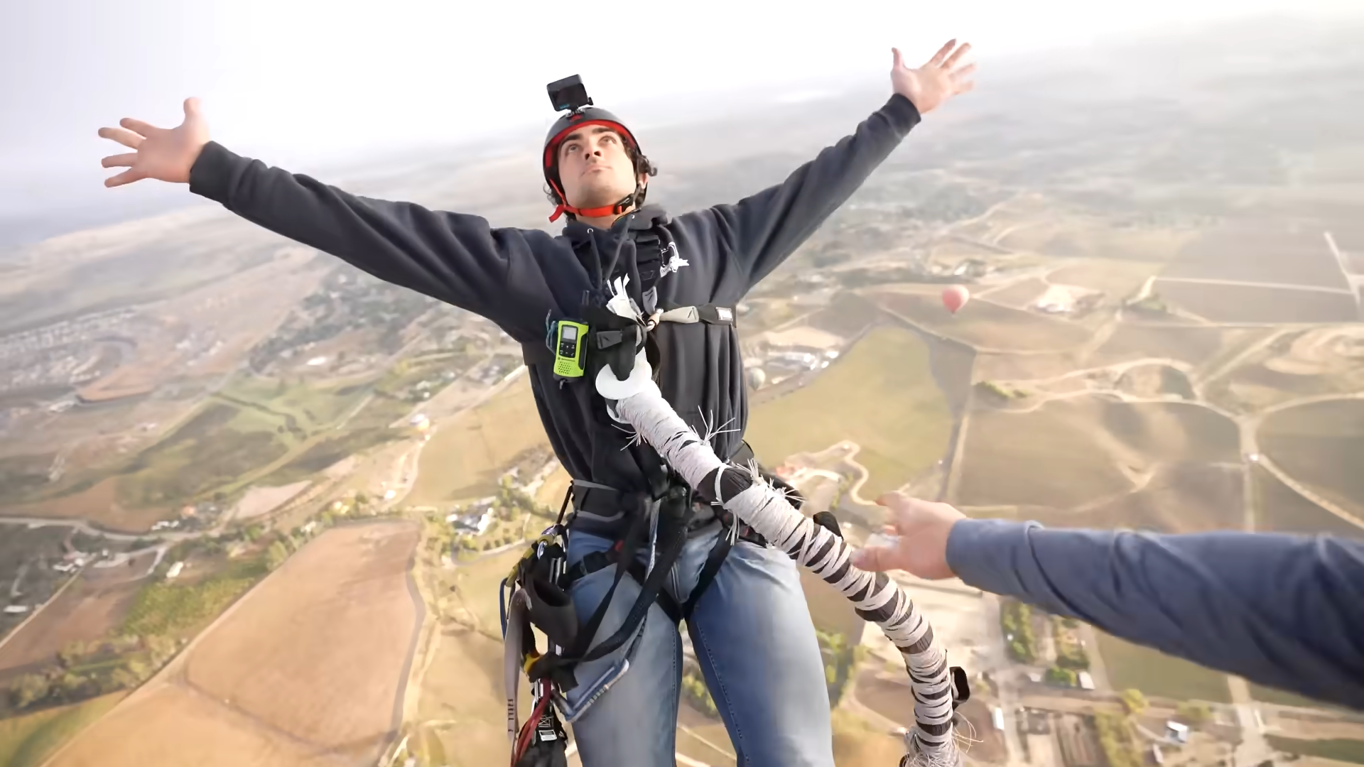This dare forced him to dangle from a flying helicopter
