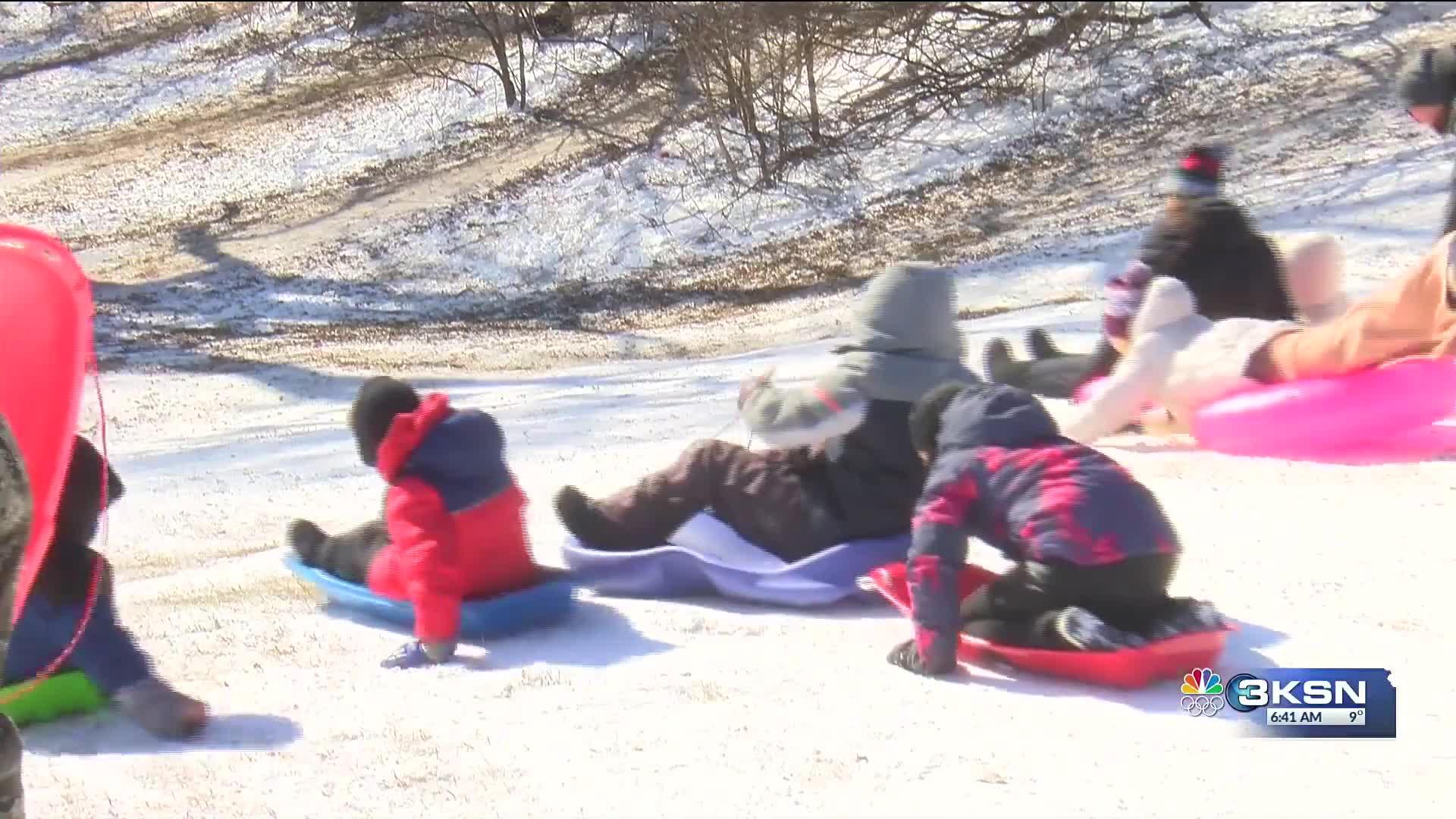 Wichita children hit area hills for sledding