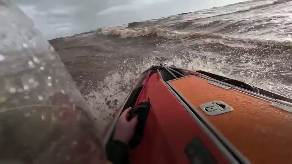 Dramatic footage shows Exmouth RNLI crew rescuing windsurfer during ...