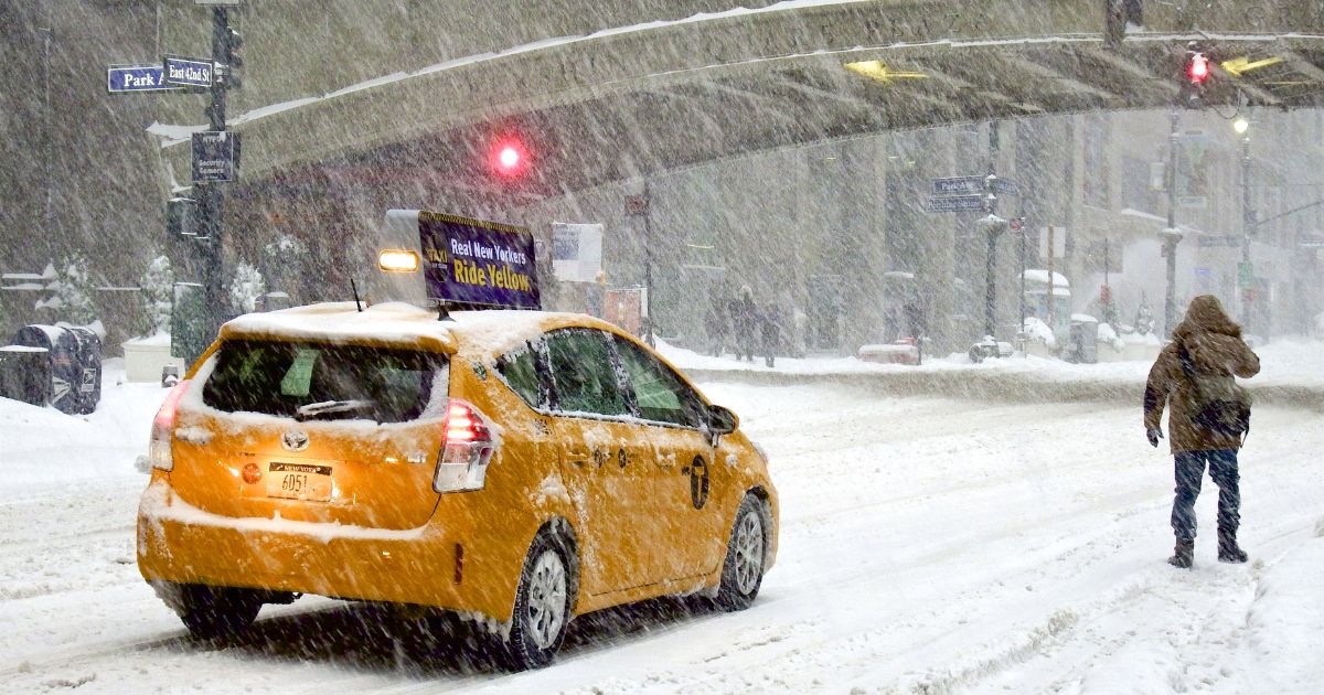 Man found frozen with snow shovel as winter storm Fern kills 34 across US