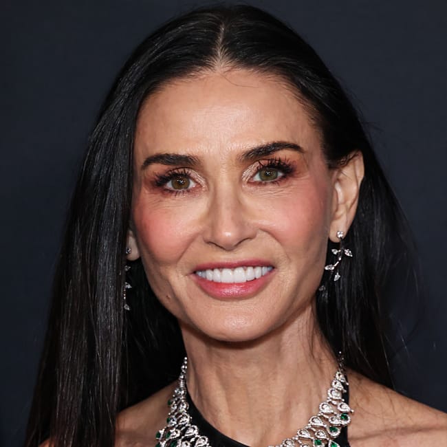 Demi Moore wears a catsuit at Paris Fashion Week