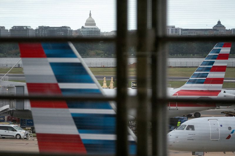 American Airlines forecasts upbeat 2026, flags up to $200 million hit ...