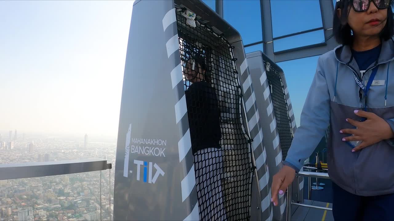 Visitors experience 1,000ft high ride that tilts over the edge of ...