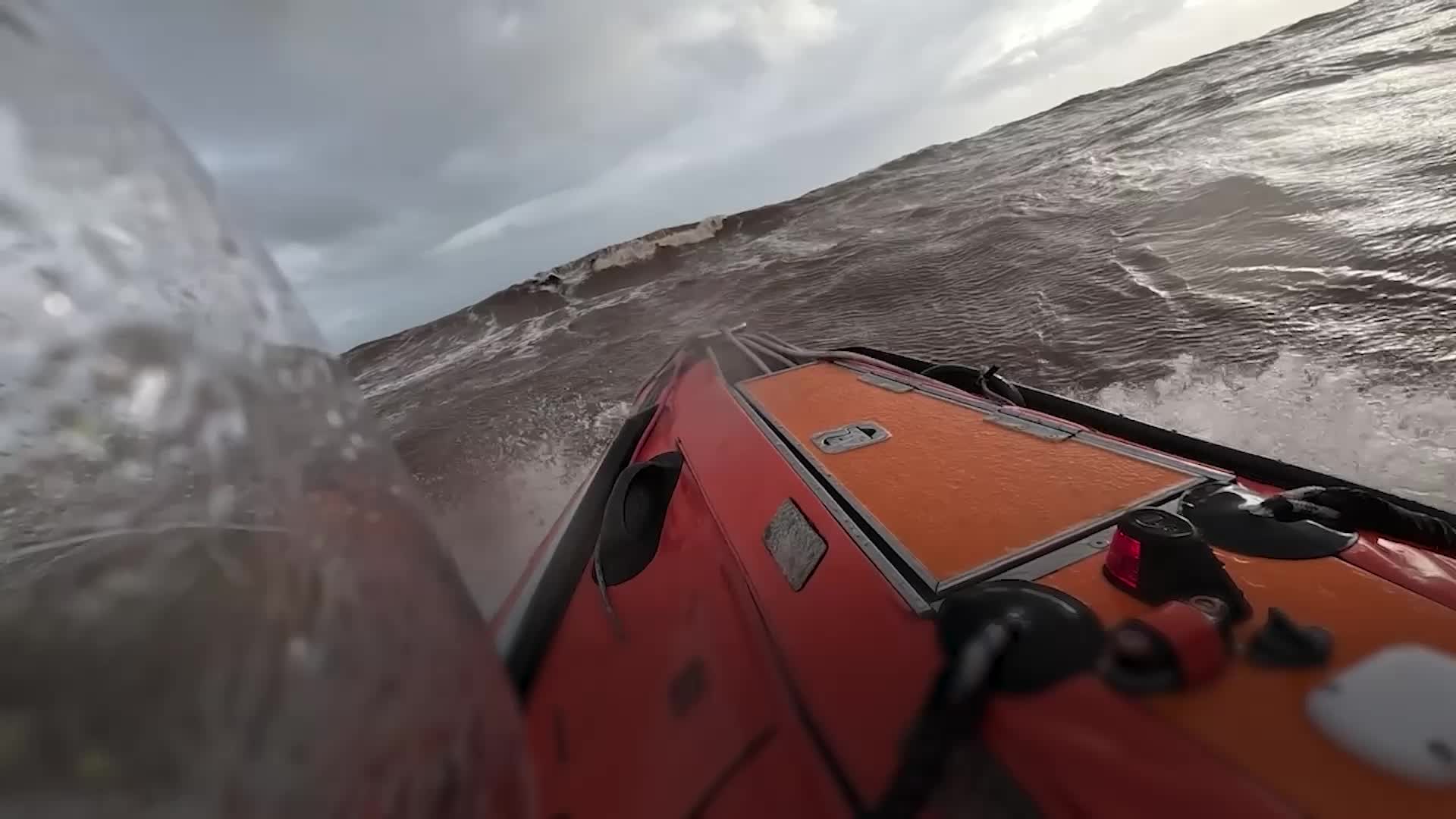 Dramatic footage shows Exmouth RNLI crew rescuing windsurfer during ...