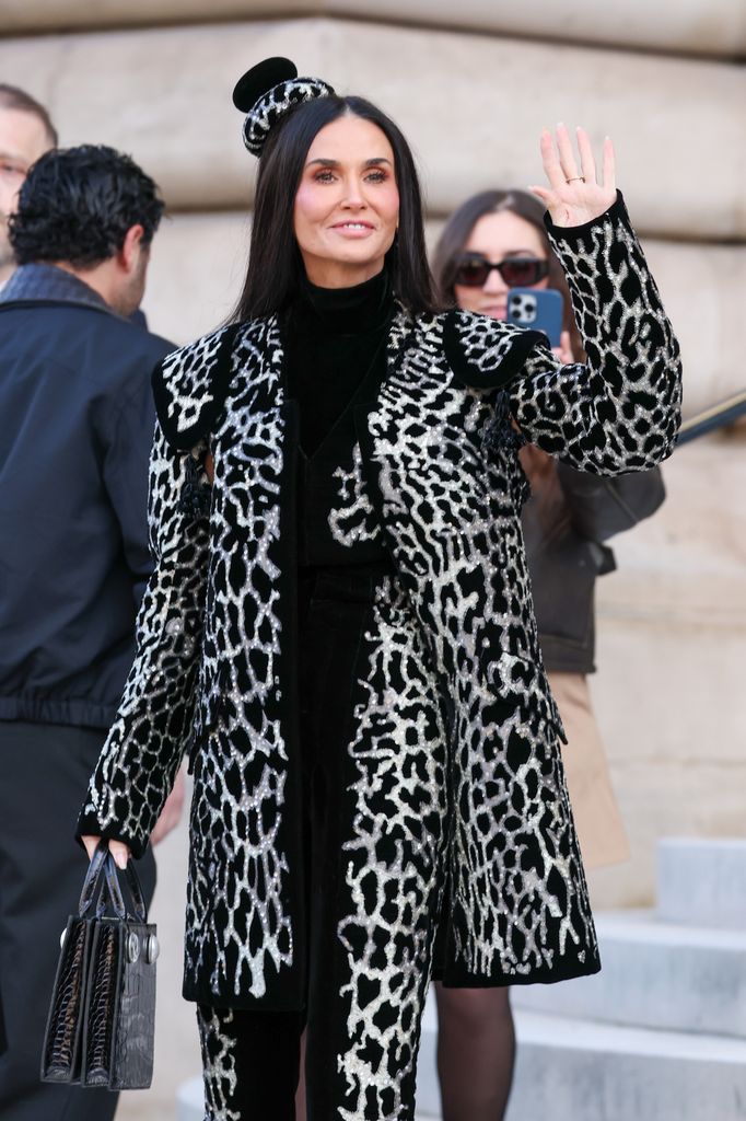 Demi Moore wows in figure-hugging catsuit during Paris Fashion Week