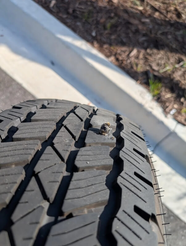 Mechanic stunned after finding unusual object lodged in customer's tire ...
