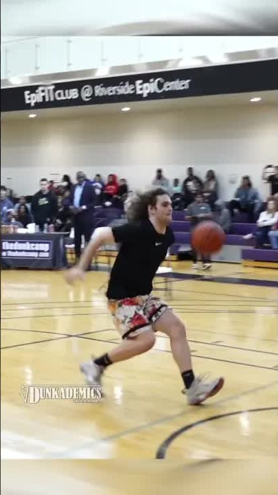 Behind the back dunk from six foot guy