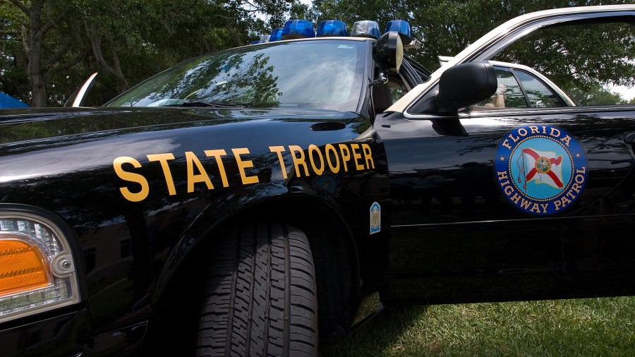 Drunk Cybertruck driver hits traffic signal, assaults wife with kids in ...