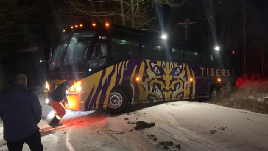 LSU team bus slides off snowy road in western Arkansas, sheriff says