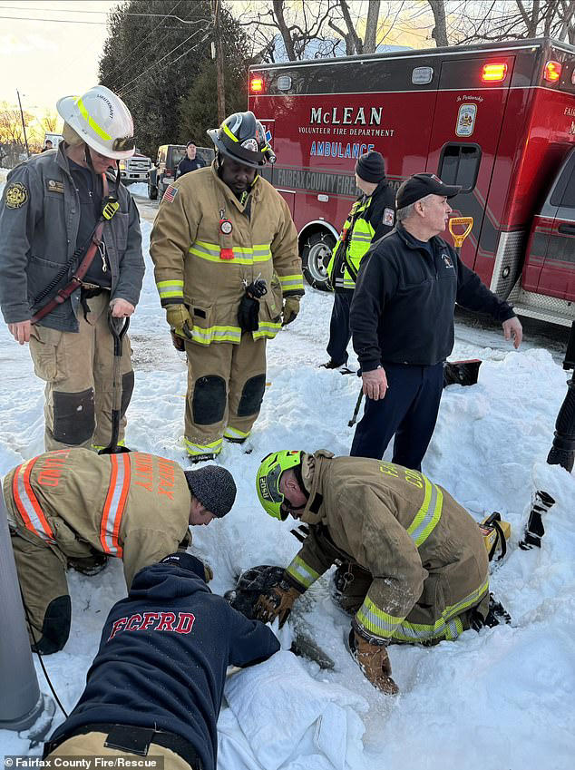 Little boy falls down deep drain while digging hole in snow