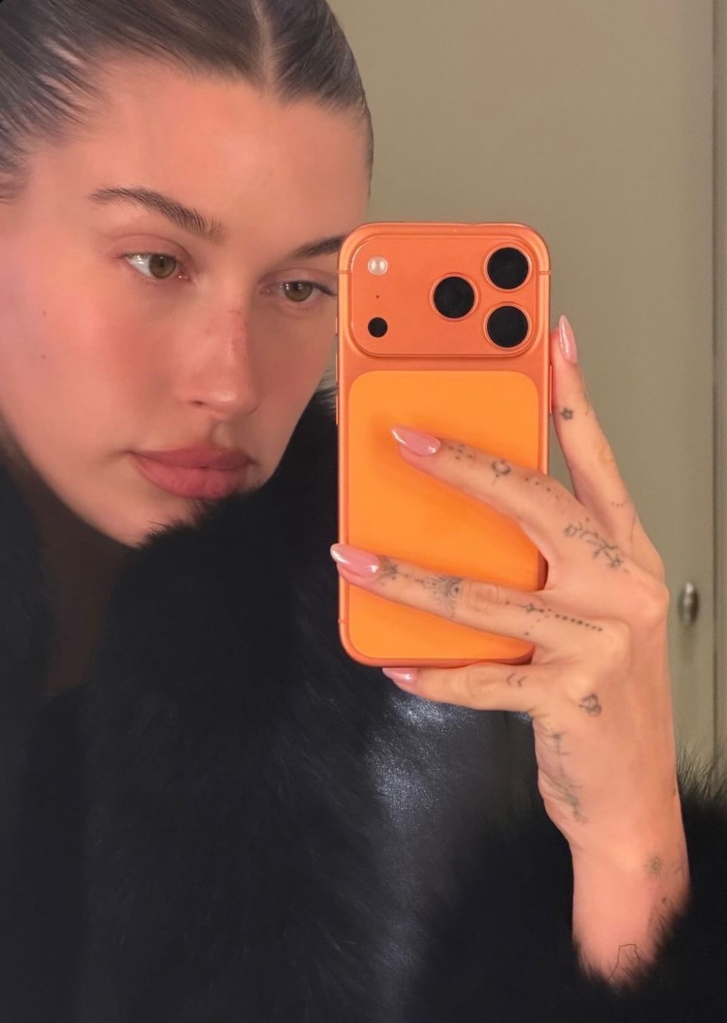 Hailey Bieber's rosewater chrome nails are a sweet hint of spring