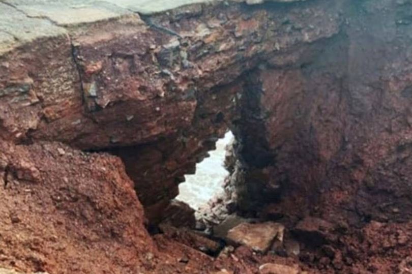Storm Chandra leaves village underwater as sinkhole shuts major UK rail ...