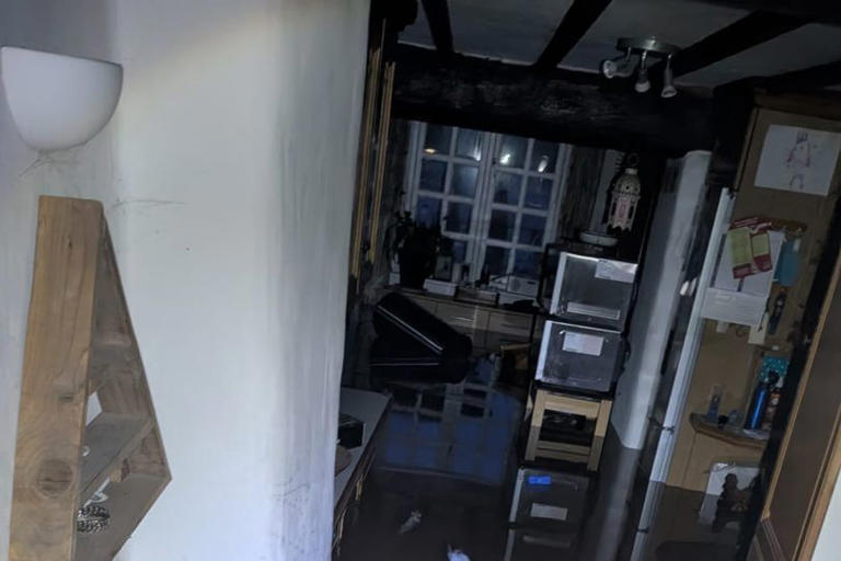 "It was horrendous": Man and dog's dramatic bedroom-window flood escape