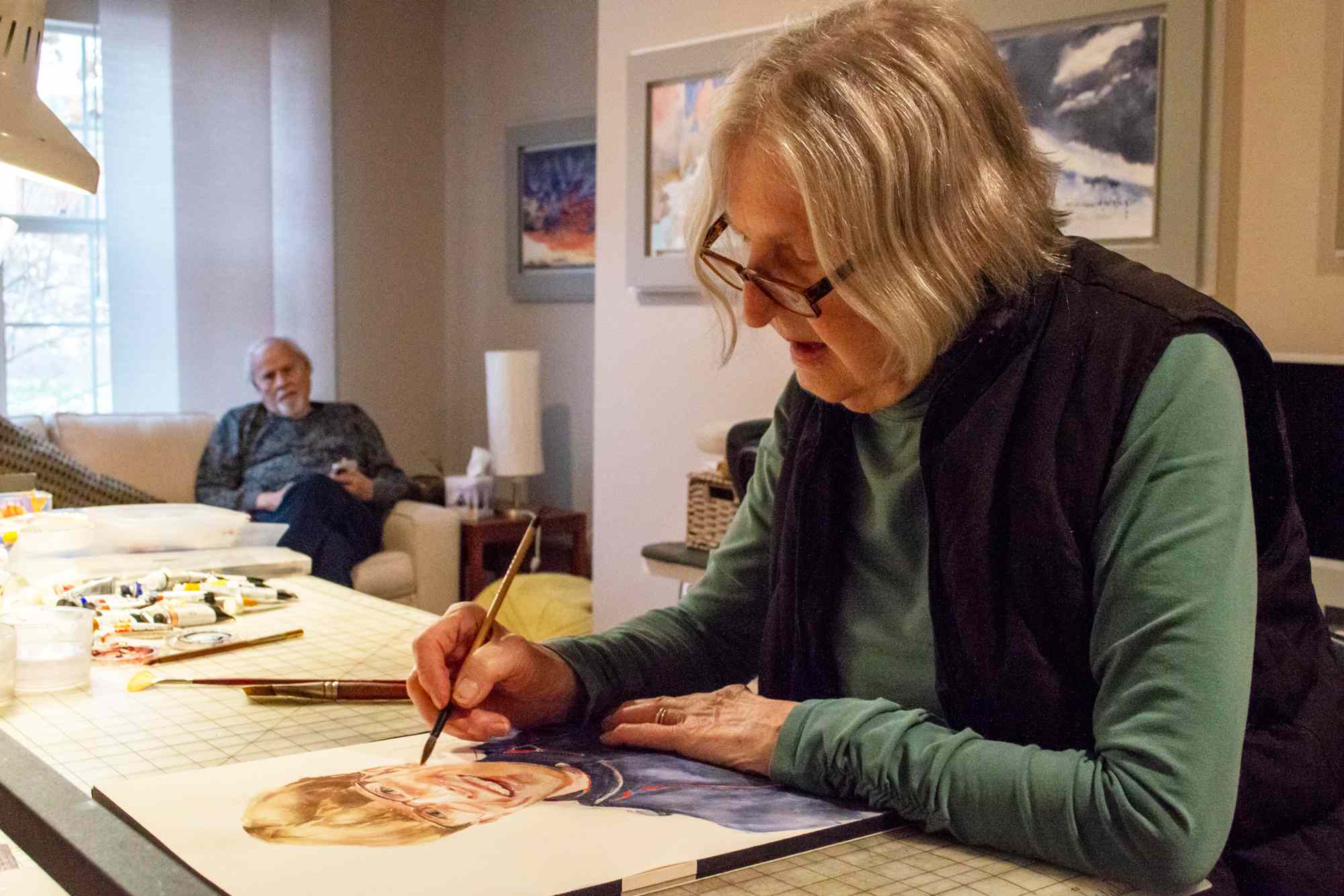 Artist surprises caregivers by asking to paint them. Her surprised ...