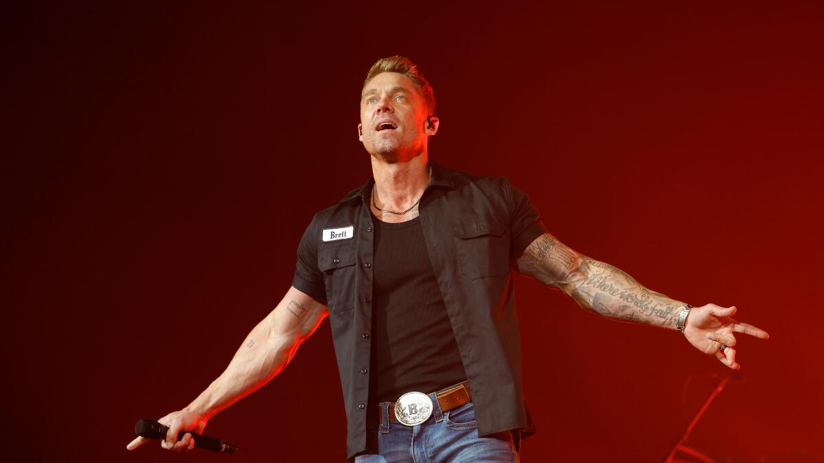 Brett Young shares moment with wife, daughters: 'My forever dance partners'