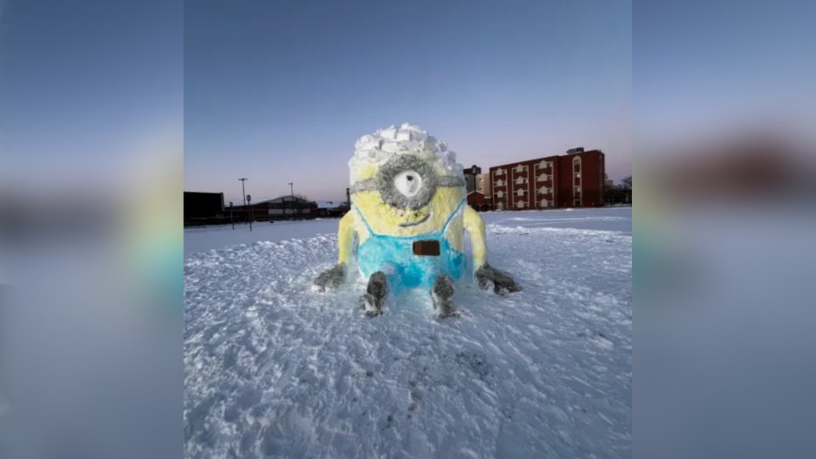 Students build giant minion out of snow on Vincennes University campus