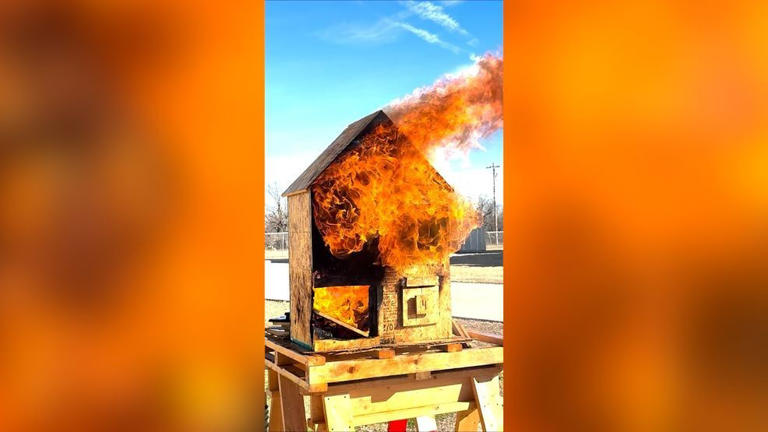 Abilene firefighters use a dollhouse to demonstrate airflow control and ...