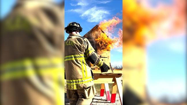 Abilene firefighters use a dollhouse to demonstrate airflow control and ...