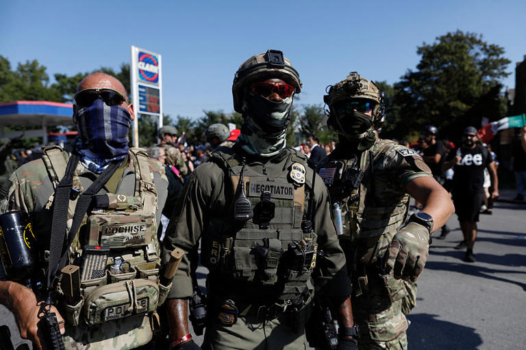 Why do ICE officers wear masks – and is it legal?