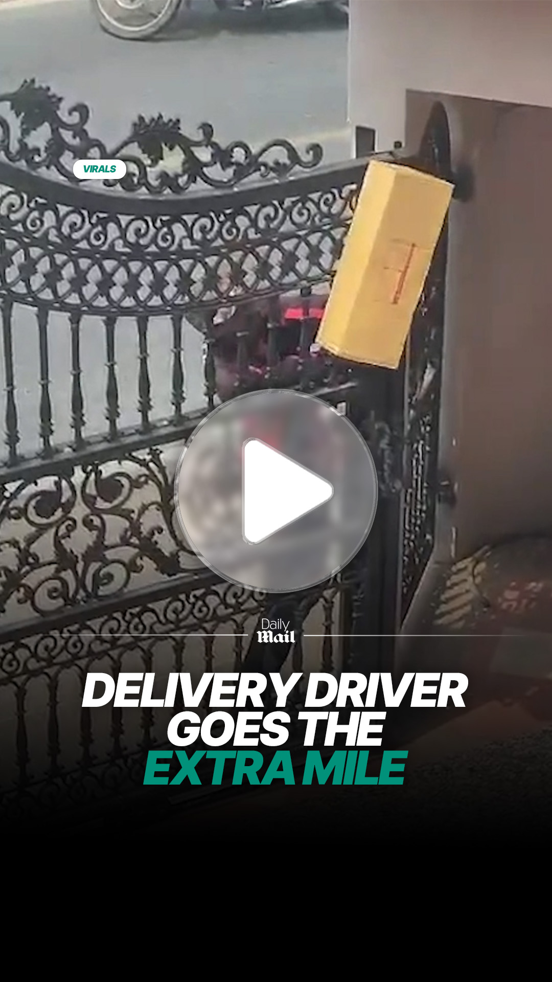 Delivery driver carefully protects parcel during drop off
