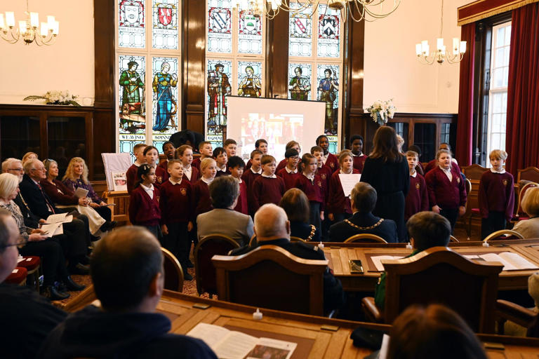 Holocaust Memorial Day was marked at two poignant ceremonies in Wigan ...