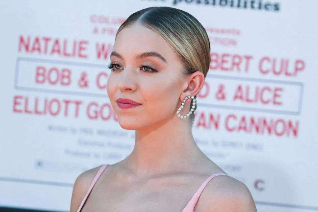 Sydney Sweeney gets a flirty surprise as NFL star Puka Nacua shoots his ...