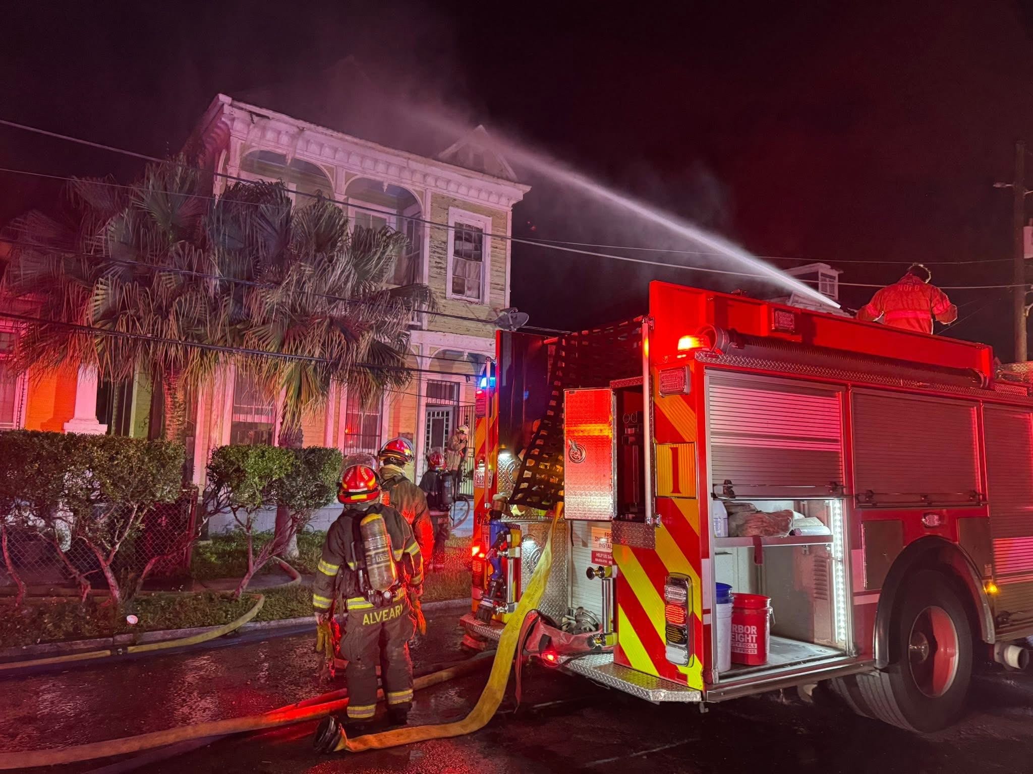 Fire crews battle blaze on Baronne, two people seen running from building