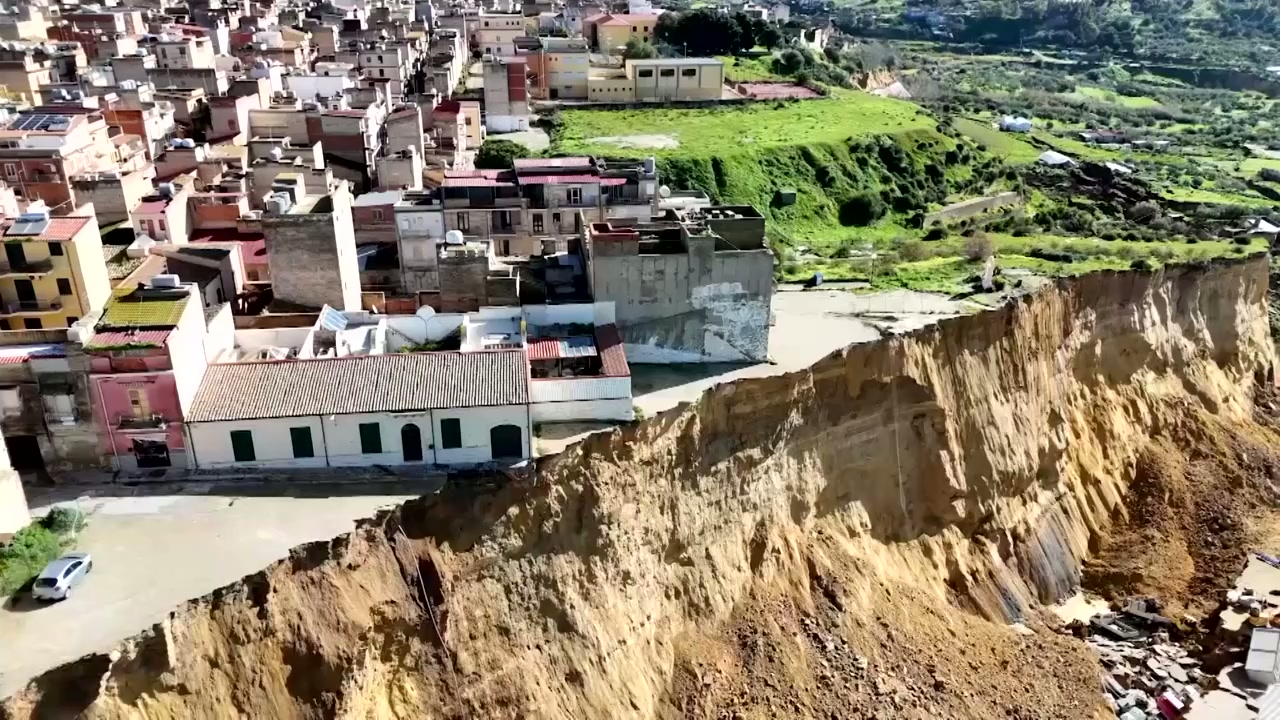 Landslide leaves Sicilian town on cliff edge after storms