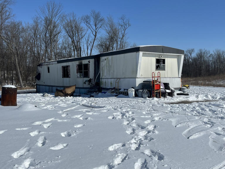 Mobile home catches fire in Henderson