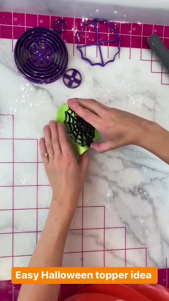 Pastel neon spiderweb cupcake toppers for easy Halloween baking