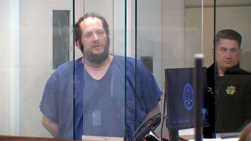 Suspect in Portland officer shooting held without bail after courtroom ...