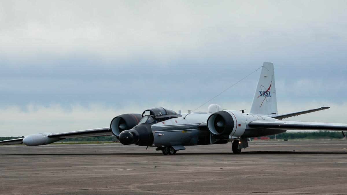 NASA jet bursts into flames on runway after landing gear fails