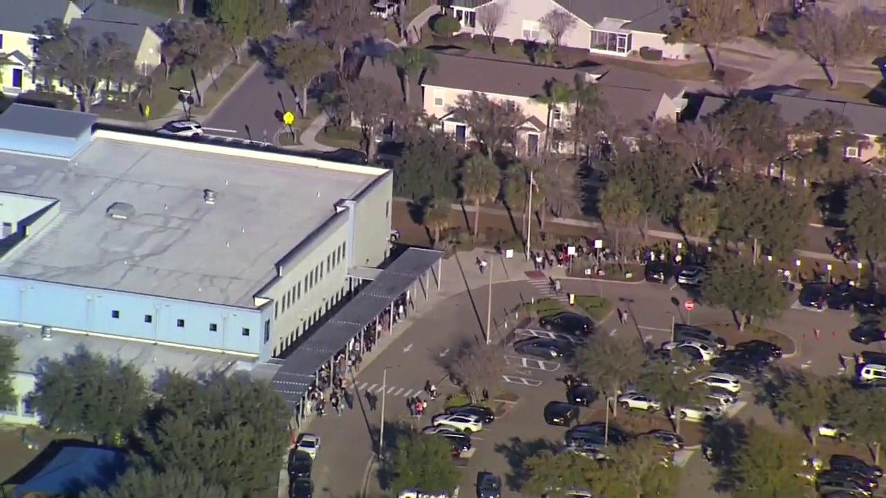 Woman injured in domestic-related shooting near Windermere school ...