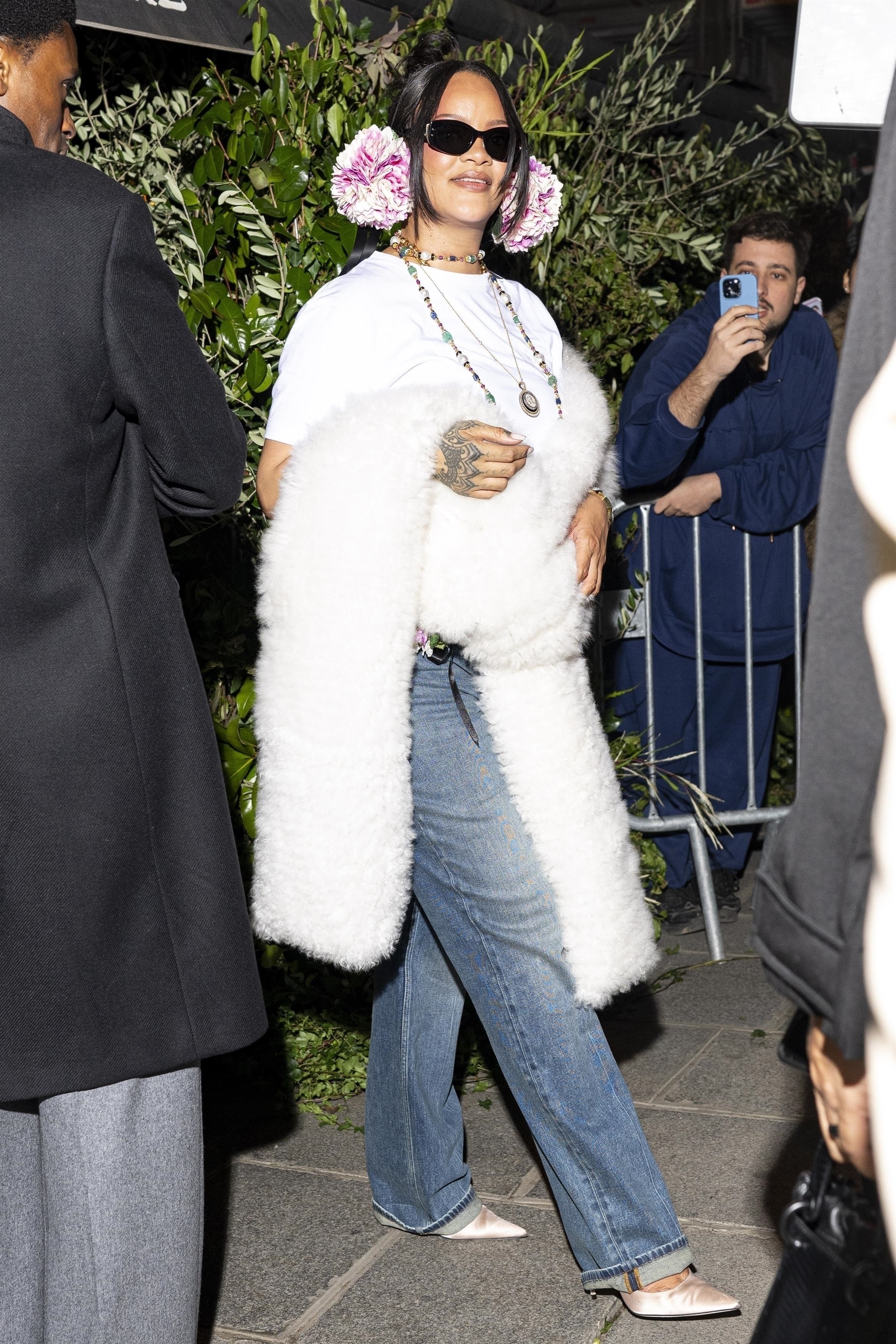 Of course Rihanna is the first to wear Dior’s floral headpiece straight ...